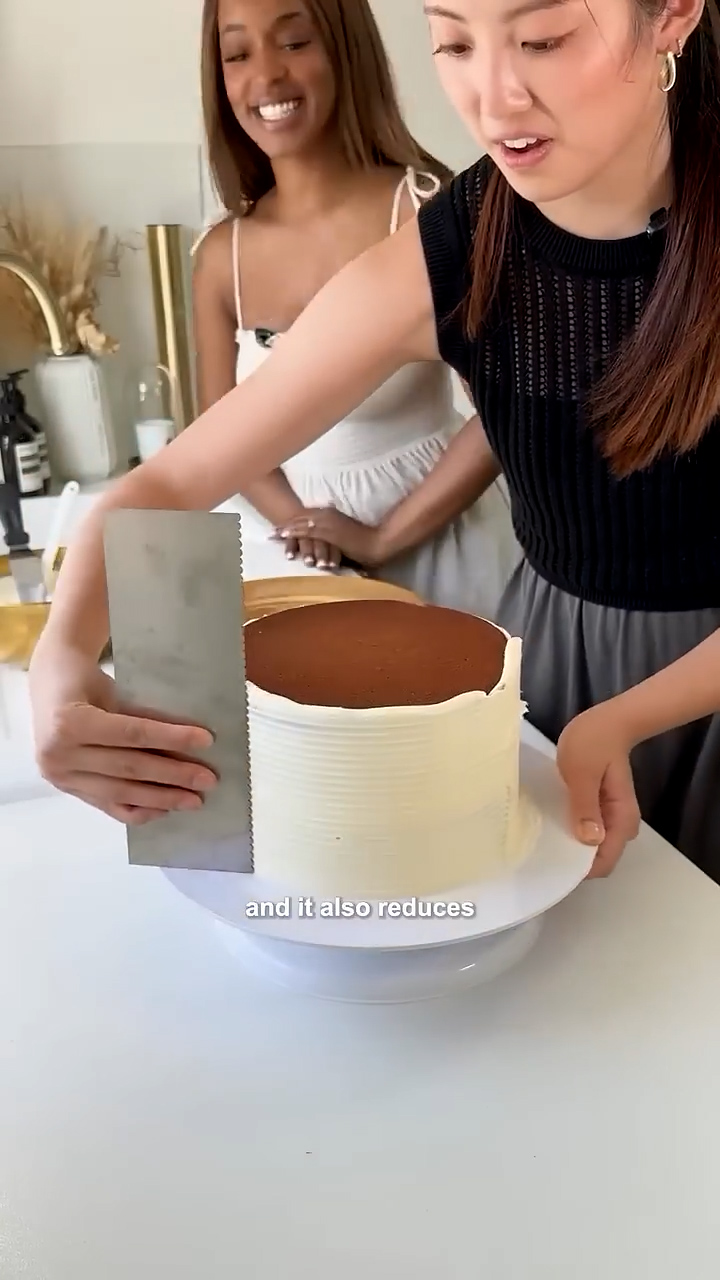 Creating an elegant gold decorated cake for the event | Fiffig Productions